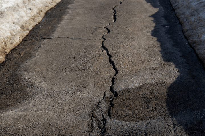 How the Freeze-Thaw Cycle Causes Uneven Concrete Around Your Home